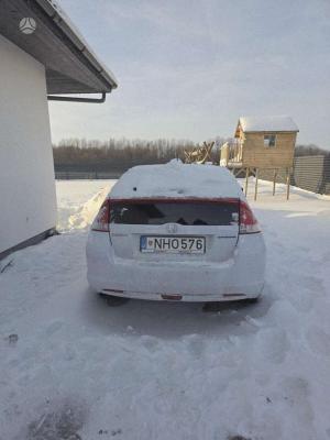 White Honda Insight 2010 in Kretinga, with an engine capacity of 1.34 L and mileage of 237 thousand km for 2000 €, photo 2 on AUTOMOTO.COM.LV