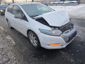 White Honda Insight 2010 in Kretinga, with an engine capacity of 1.34 L and mileage of 237 thousand km for 2000 €, photo 15 on AUTOMOTO.COM.LV