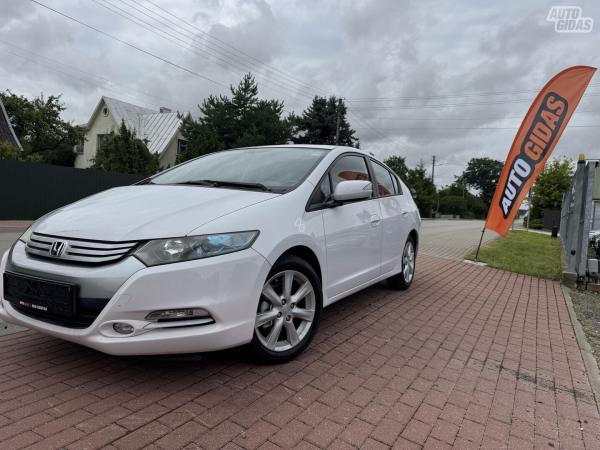 White Honda Insight 2010 in Kaunas, with an engine capacity of 1.30 L and mileage of 206 thousand km for 3999 €, photo 1 on AUTOMOTO.COM.LV