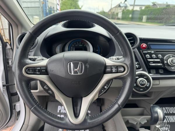 White Honda Insight 2010 in Kaunas, with an engine capacity of 1.30 L and mileage of 206 thousand km for 3999 €, photo 10 on AUTOMOTO.COM.LV