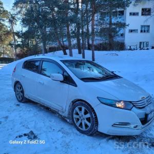 Balts Honda Insight 2009 Rīga, ar dzinēja tilpumu 1.30 L un nobraukumu 340 tūkst. km par 1550 €, foto  vietnē AUTOMOTO.COM.LV
