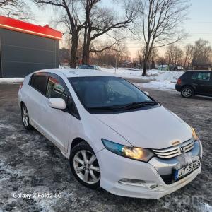 Balts Honda Insight 2009 Rīga, ar dzinēja tilpumu 1.40 L un nobraukumu 345 tūkst. km par 2000 €, foto  vietnē AUTOMOTO.COM.LV