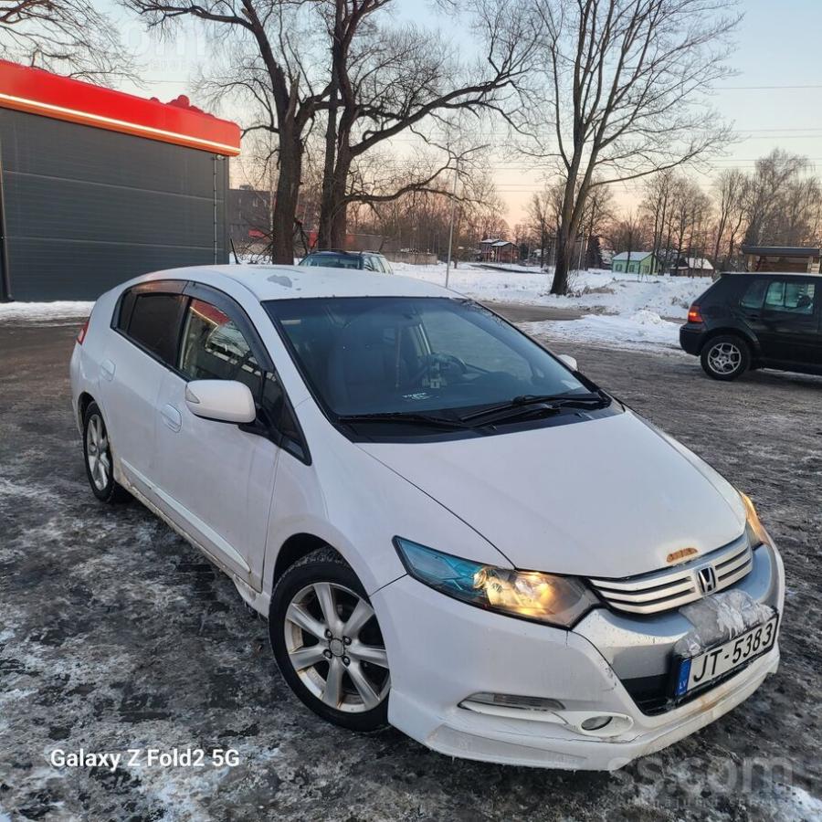 Balts Honda Insight 2009 Rīga, ar dzinēja tilpumu 1.40 L un nobraukumu 345 tūkst. km par 2000 €, foto 1 vietnē AUTOMOTO.COM.LV