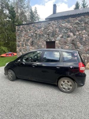 Black Honda Jazz 2005 in Vilnius, with an engine capacity of 1.34 L and mileage of 222 thousand km for 1850 €, photo 7 on AUTOMOTO.COM.LV
