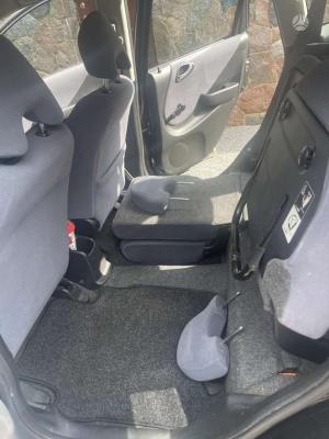 Black Honda Jazz 2005 in Vilnius, with an engine capacity of 1.34 L and mileage of 222 thousand km for 1850 €, photo 11 on AUTOMOTO.COM.LV