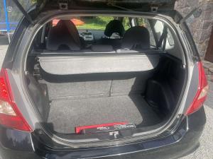 Black Honda Jazz 2005 in Vilnius, with an engine capacity of 1.34 L and mileage of 222 thousand km for 1850 €, photo 14 on AUTOMOTO.COM.LV