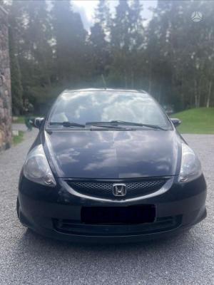 Black Honda Jazz 2005 in Vilnius, with an engine capacity of 1.34 L and mileage of 222 thousand km for 1850 €, photo 23 on AUTOMOTO.COM.LV