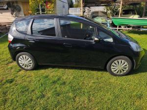 Black Honda Jazz 2011 in Utena, with an engine capacity of 1.34 L and mileage of 180 thousand km for 3950 €, photo 4 on AUTOMOTO.COM.LV