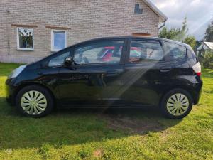 Black Honda Jazz 2011 in Utena, with an engine capacity of 1.34 L and mileage of 180 thousand km for 3950 €, photo 5 on AUTOMOTO.COM.LV