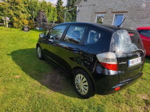 Black Honda Jazz 2011 in Utena, with an engine capacity of 1.34 L and mileage of 180 thousand km for 3950 €, photo 6 on AUTOMOTO.COM.LV