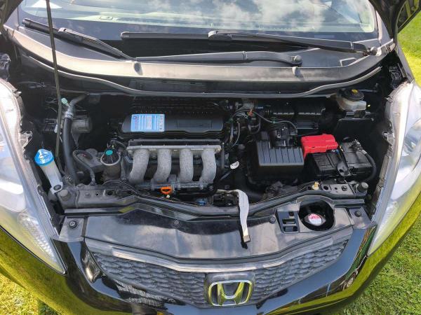 Black Honda Jazz 2011 in Utena, with an engine capacity of 1.34 L and mileage of 180 thousand km for 3950 €, photo 8 on AUTOMOTO.COM.LV