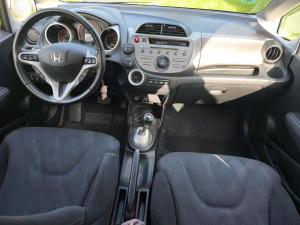 Black Honda Jazz 2011 in Utena, with an engine capacity of 1.34 L and mileage of 180 thousand km for 3950 €, photo 15 on AUTOMOTO.COM.LV