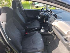 Black Honda Jazz 2011 in Utena, with an engine capacity of 1.34 L and mileage of 180 thousand km for 3950 €, photo 16 on AUTOMOTO.COM.LV