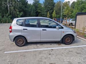 Blue Honda Jazz 2003 in Riga, with an engine capacity of 1.40 L and mileage of 280 thousand km for 1050 €, photo 3 on AUTOMOTO.COM.LV