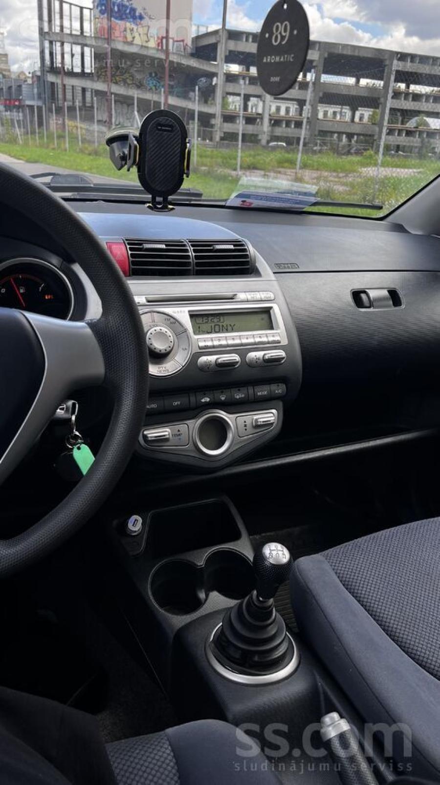 Blue Honda Jazz 2005 in Riga, with an engine capacity of 1.30 L and mileage of 203 thousand km for 2350 €, photo 6 on AUTOMOTO.COM.LV
