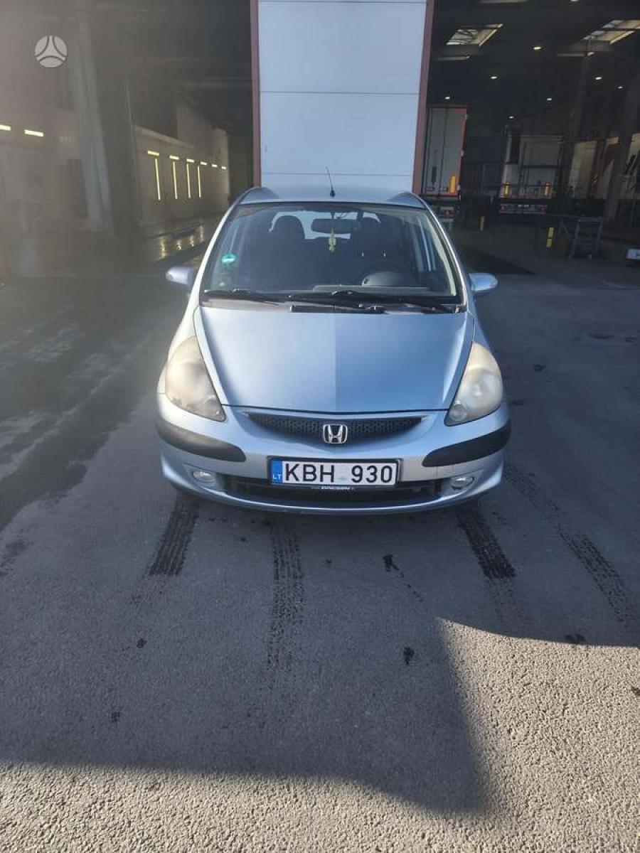 Blue Honda Jazz 2005 in Vilnius, with an engine capacity of 1.34 L and mileage of 210 thousand km for 1500 €, photo 6 on AUTOMOTO.COM.LV
