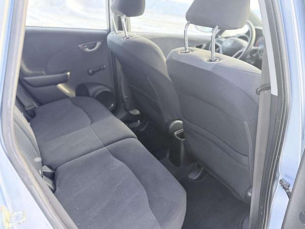 Blue Honda Jazz 2010 in Vilnius, with an engine capacity of 1.34 L and mileage of 223 thousand km for 3500 €, photo 11 on AUTOMOTO.COM.LV