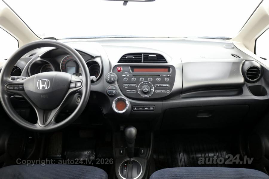 Brown Honda Jazz 2011 in Tallinn, with an engine capacity of 1.30 L and mileage of 108 thousand km for 2499 €, photo 6 on AUTOMOTO.COM.LV