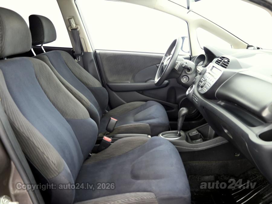 Brown Honda Jazz 2011 in Tallinn, with an engine capacity of 1.30 L and mileage of 108 thousand km for 2499 €, photo 7 on AUTOMOTO.COM.LV