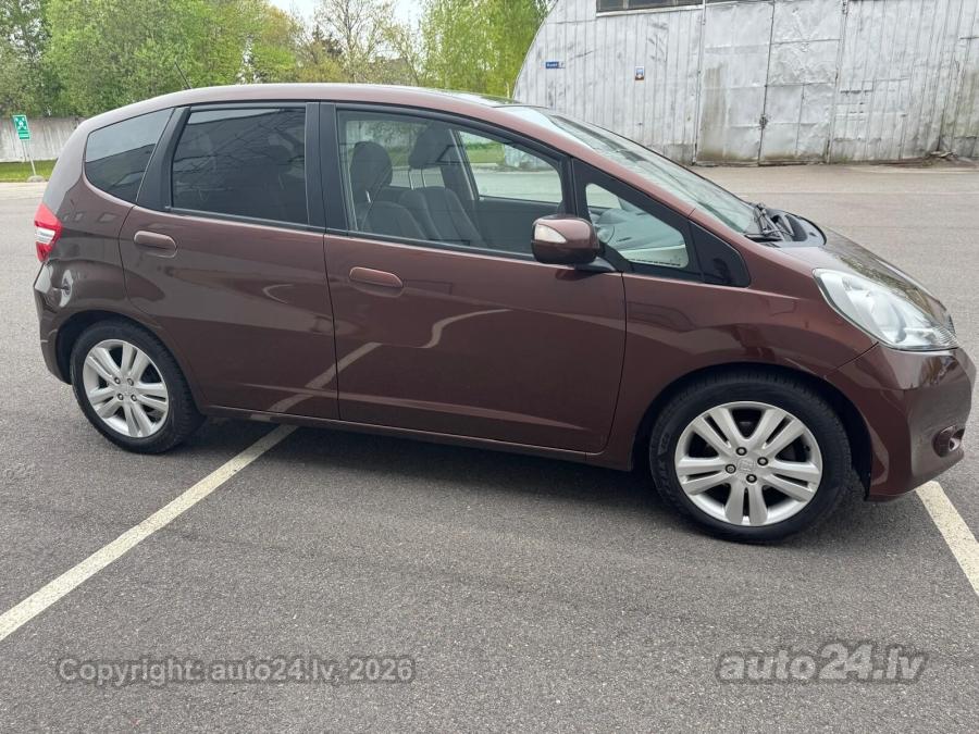 Brown Honda Jazz 2012 in Tallinn, with an engine capacity of 1.30 L and mileage of 132 thousand km for 4700 €, photo 5 on AUTOMOTO.COM.LV
