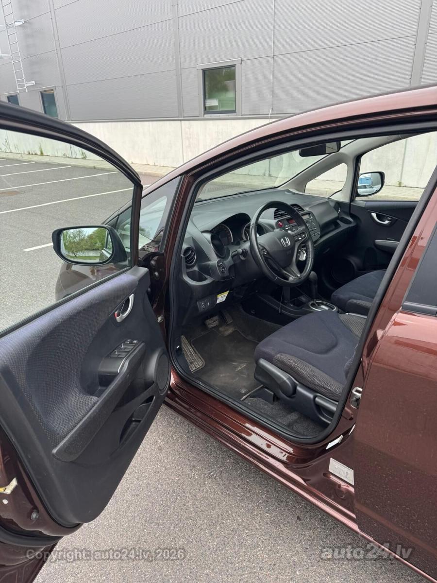Brown Honda Jazz 2012 in Tallinn, with an engine capacity of 1.30 L and mileage of 132 thousand km for 4700 €, photo 7 on AUTOMOTO.COM.LV