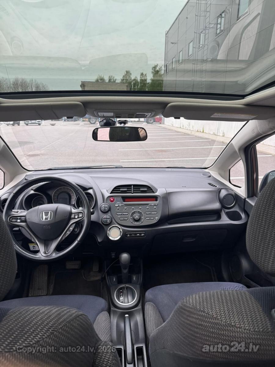Brown Honda Jazz 2012 in Tallinn, with an engine capacity of 1.30 L and mileage of 132 thousand km for 4700 €, photo 11 on AUTOMOTO.COM.LV
