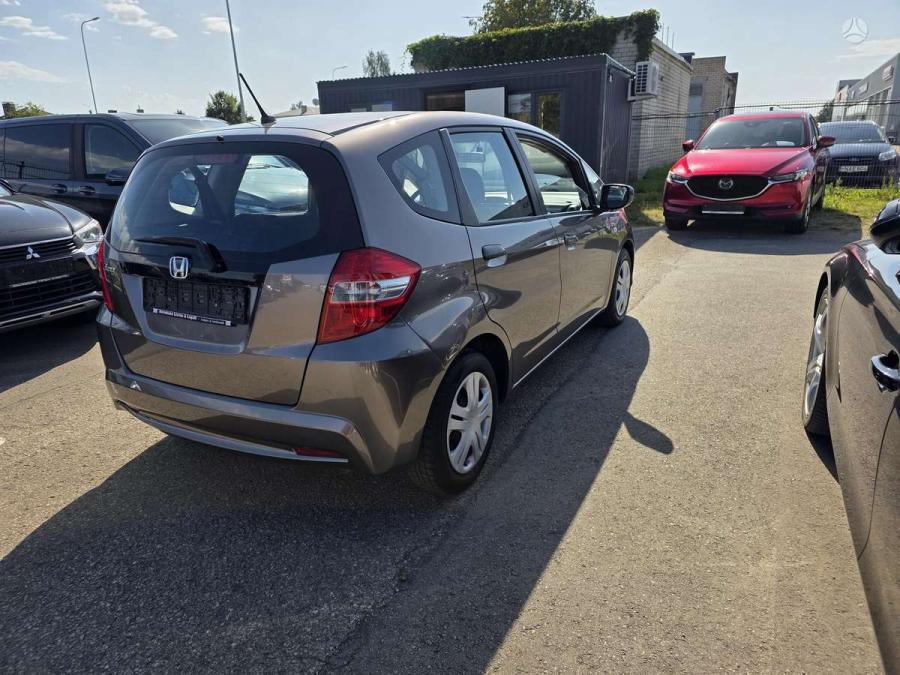 Brown Honda Jazz 2014 in Siauliai, with an engine capacity of 1.20 L and mileage of 85 thousand km for 4900 €, photo 5 on AUTOMOTO.COM.LV