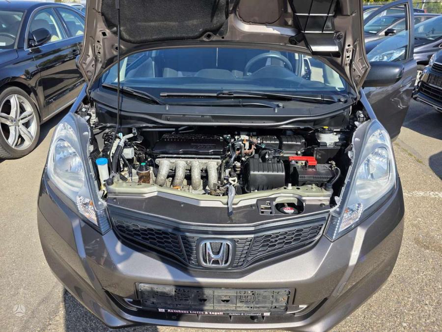 Brown Honda Jazz 2014 in Siauliai, with an engine capacity of 1.20 L and mileage of 85 thousand km for 4900 €, photo 11 on AUTOMOTO.COM.LV