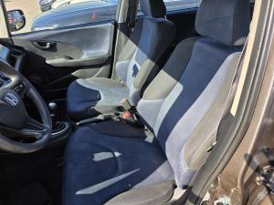 Brown Honda Jazz 2014 in Siauliai, with an engine capacity of 1.20 L and mileage of 85 thousand km for 4900 €, photo 13 on AUTOMOTO.COM.LV