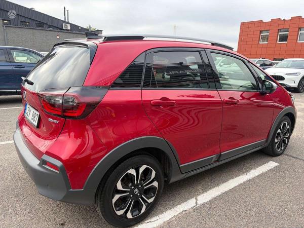 Red Honda Jazz Crosstar 2021 in Vilnius, with an engine capacity of 1.50 L and mileage of 125 thousand km for 17500 €, photo 4 on AUTOMOTO.COM.LV