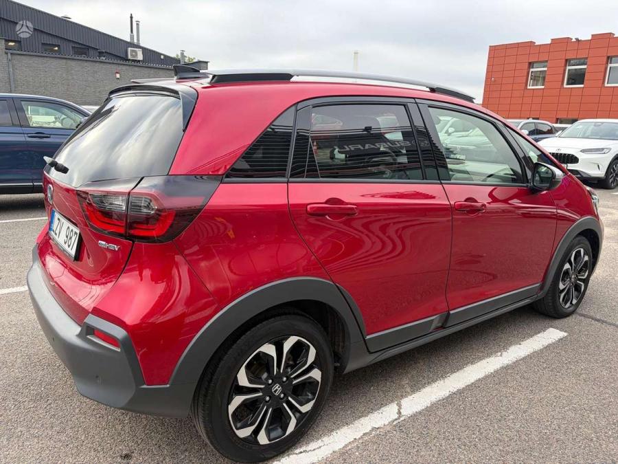Red Honda Jazz Crosstar 2021 in Vilnius, with an engine capacity of 1.50 L and mileage of 125 thousand km for 17500 €, photo 5 on AUTOMOTO.COM.LV