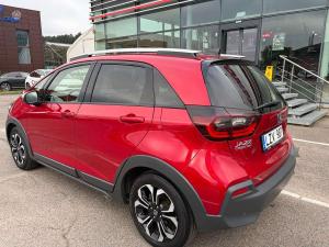 Red Honda Jazz Crosstar 2021 in Vilnius, with an engine capacity of 1.50 L and mileage of 125 thousand km for 17500 €, photo 6 on AUTOMOTO.COM.LV