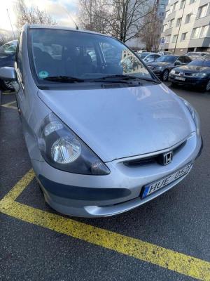 Grey Honda Jazz 2003 in Vilnius, with an engine capacity of 1.34 L and mileage of 252 thousand km for 1050 €, photo  on AUTOMOTO.COM.LV