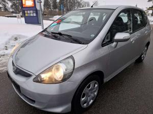 Grey Honda Jazz 2006 in Utena, with an engine capacity of 1.34 L and mileage of 250 thousand km for 1850 €, photo  on AUTOMOTO.COM.LV