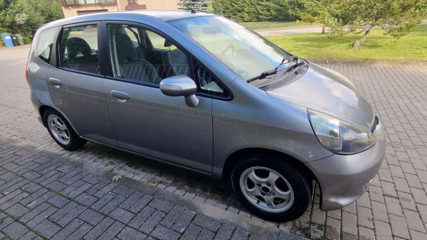 Pelēks Honda Jazz 2006 Marijampole, ar dzinēja tilpumu 1.34 L un nobraukumu 188 tūkst. km par 800 €, foto 7 vietnē AUTOMOTO.COM.LV