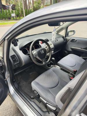 Grey Honda Jazz 2007 in Kaunas, with an engine capacity of 1.34 L and mileage of 142 thousand km for 2600 €, photo 15 on AUTOMOTO.COM.LV
