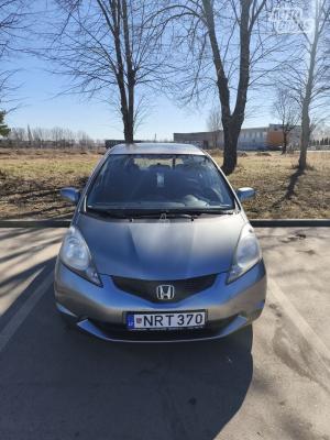 Pelēks Honda Jazz 2009 Tauragė, ar dzinēja tilpumu 1.20 L un nobraukumu 170 tūkst. km par 2300 €, foto  vietnē AUTOMOTO.COM.LV