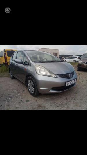 Grey Honda Jazz 2010 in Vilnius, with an engine capacity of 1.20 L and mileage of 225 thousand km for 3150 €, photo  on AUTOMOTO.COM.LV