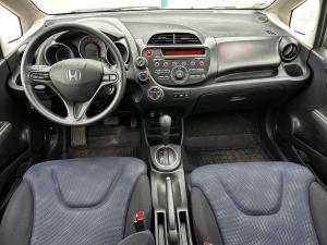 Grey Honda Jazz 2011 in Siauliai, with an engine capacity of 1.30 L and mileage of 62 thousand km for 3250 €, photo 11 on AUTOMOTO.COM.LV