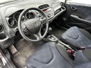 Grey Honda Jazz 2011 in Siauliai, with an engine capacity of 1.30 L and mileage of 62 thousand km for 3250 €, photo 15 on AUTOMOTO.COM.LV