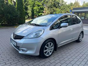 Grey Honda Jazz 2012 in Vilnius, with an engine capacity of 1.34 L and mileage of 241 thousand km for 4200 €, photo  on AUTOMOTO.COM.LV
