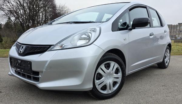 Grey Honda Jazz 2015 in Siauliai, with an engine capacity of 1.20 L and mileage of 260 thousand km for 3690 €, photo 6 on AUTOMOTO.COM.LV
