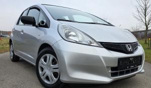 Grey Honda Jazz 2015 in Siauliai, with an engine capacity of 1.20 L and mileage of 260 thousand km for 3750 €, photo 3 on AUTOMOTO.COM.LV