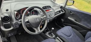 Grey Honda Jazz 2015 in Siauliai, with an engine capacity of 1.20 L and mileage of 260 thousand km for 3750 €, photo 14 on AUTOMOTO.COM.LV