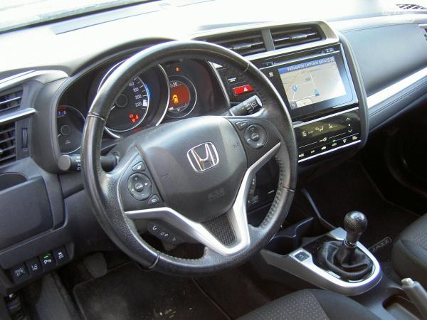 Grey Honda Jazz 2017 in Vilnius, with an engine capacity of 1.30 L and mileage of 117 thousand km for 8499 €, photo 10 on AUTOMOTO.COM.LV