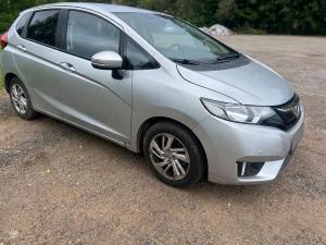 Grey Honda Jazz 2017 in Raseiniai, with an engine capacity of 1.32 L and mileage of 17 thousand km for 6999 €, photo 3 on AUTOMOTO.COM.LV