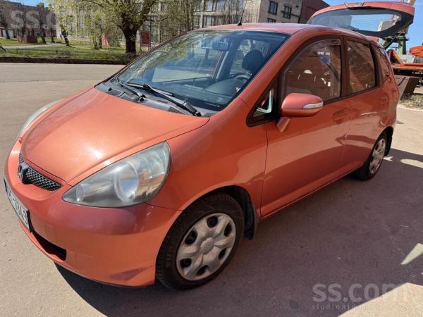 Orange Honda Jazz 2007 in Liepaja, with an engine capacity of 1.30 L and mileage of 143 thousand km for 1100 €, photo 1 on AUTOMOTO.COM.LV