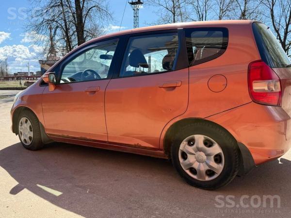 Orange Honda Jazz 2007 in Liepaja, with an engine capacity of 1.30 L and mileage of 143 thousand km for 1100 €, photo 7 on AUTOMOTO.COM.LV