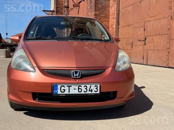 Orange Honda Jazz 2007 in Liepaja, with an engine capacity of 1.30 L and mileage of 143 thousand km for 1100 €, photo 9 on AUTOMOTO.COM.LV