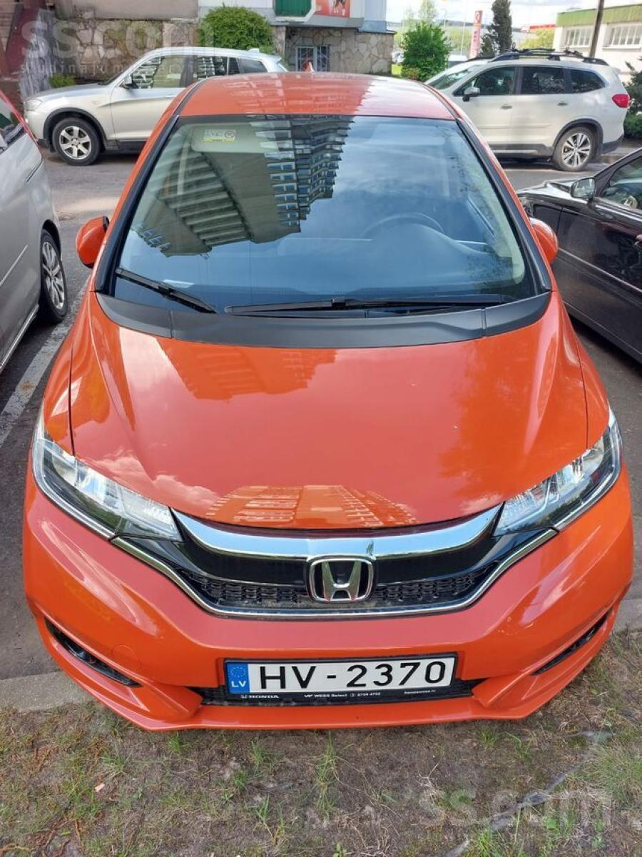 Orange Honda Jazz 2019 in Riga, with an engine capacity of 1.30 L and mileage of 8 thousand km for 2100 €, photo 1 on AUTOMOTO.COM.LV